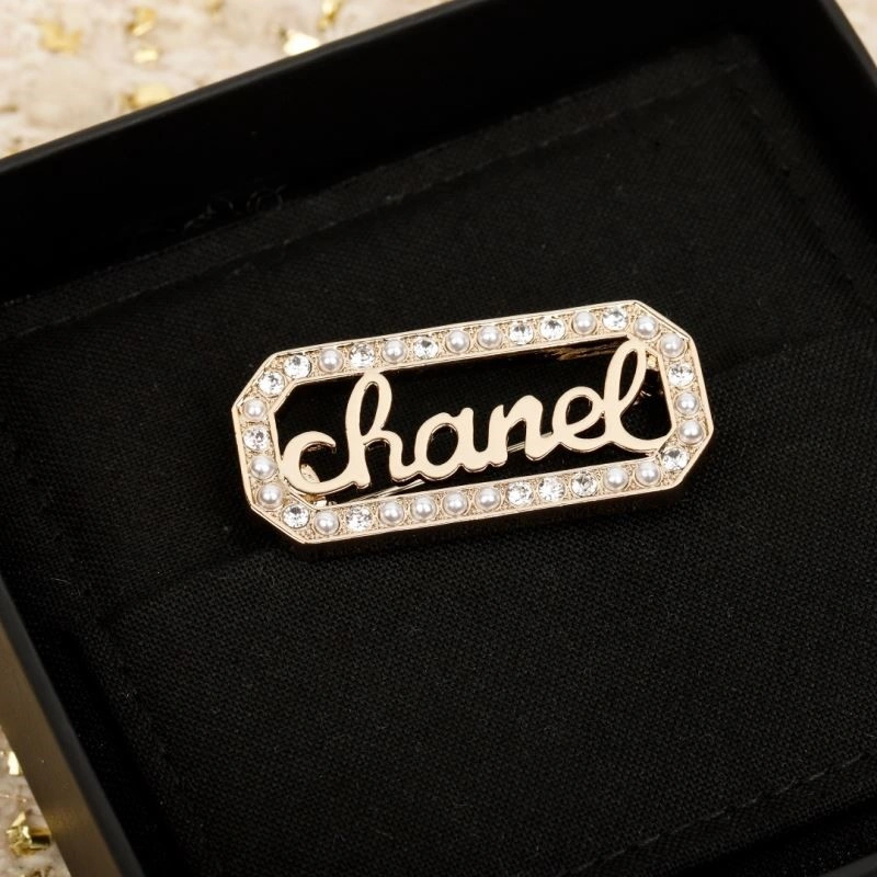 Indistinguishable Chanel Brooches