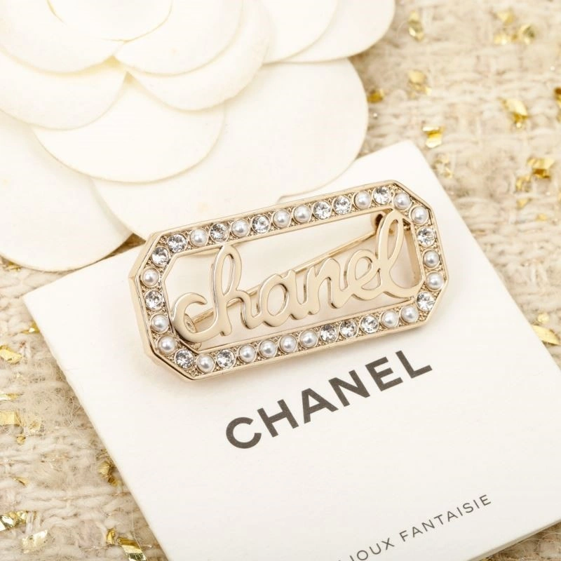 Indistinguishable Chanel Brooches