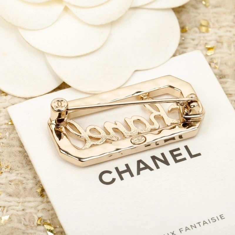 Indistinguishable Chanel Brooches