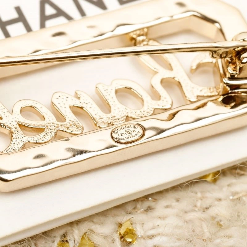 Indistinguishable Chanel Brooches