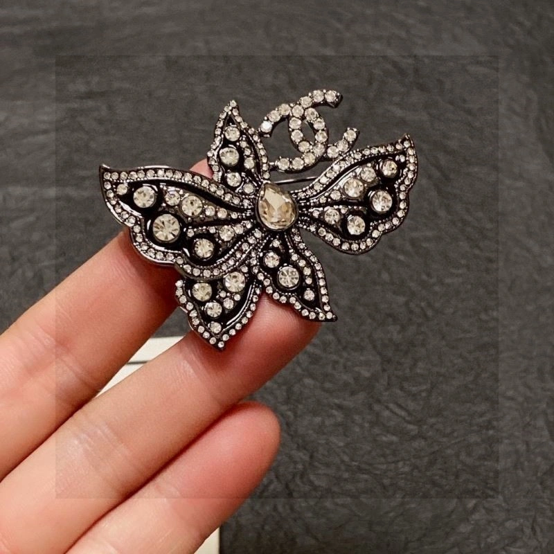 Reasonably priced Chanel Brooches
