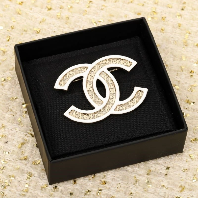 Indistinguishable Chanel Brooches
