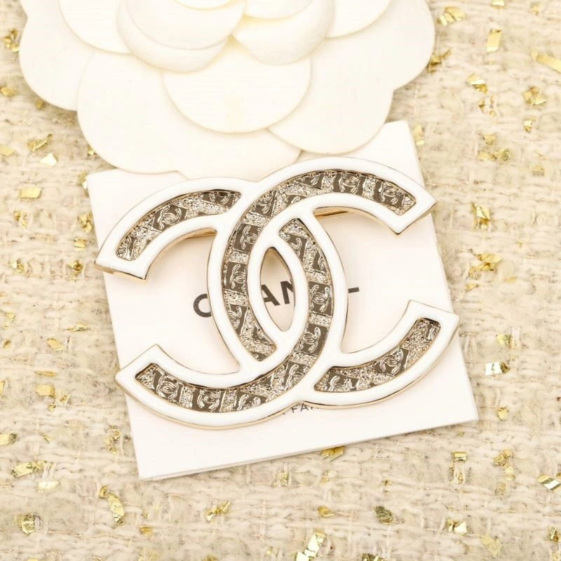 Indistinguishable Chanel Brooches