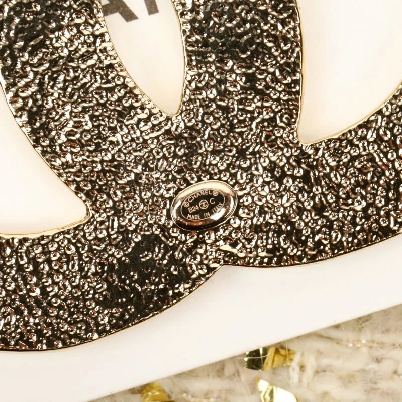 Indistinguishable Chanel Brooches