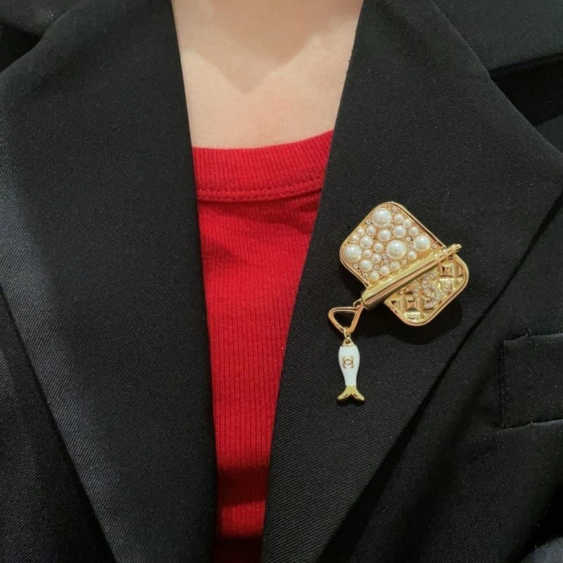 Indistinguishable Chanel Brooches