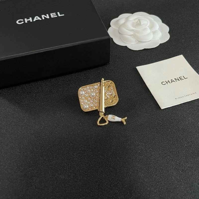 Indistinguishable Chanel Brooches