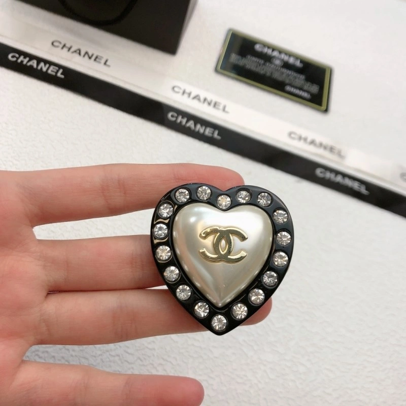 Reasonably priced Chanel Brooches