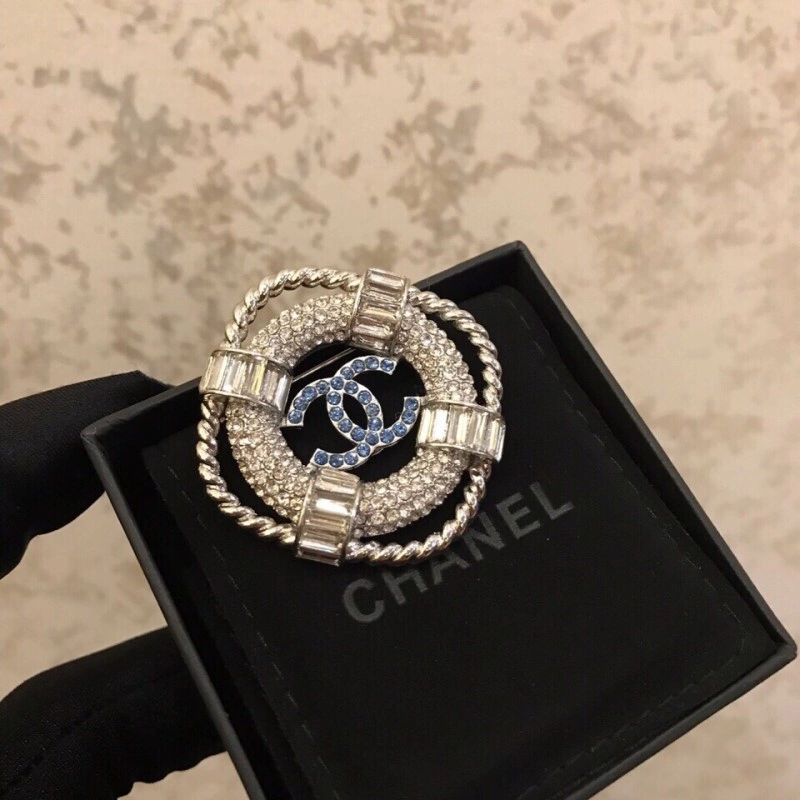 Cut-rate Chanel Brooches