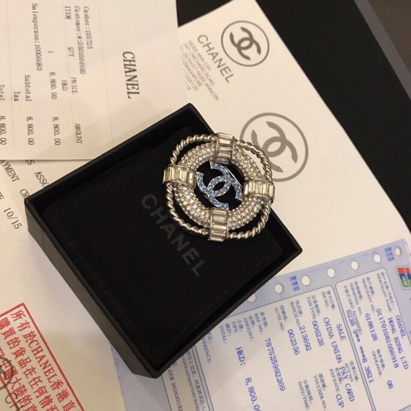 Cut-rate Chanel Brooches