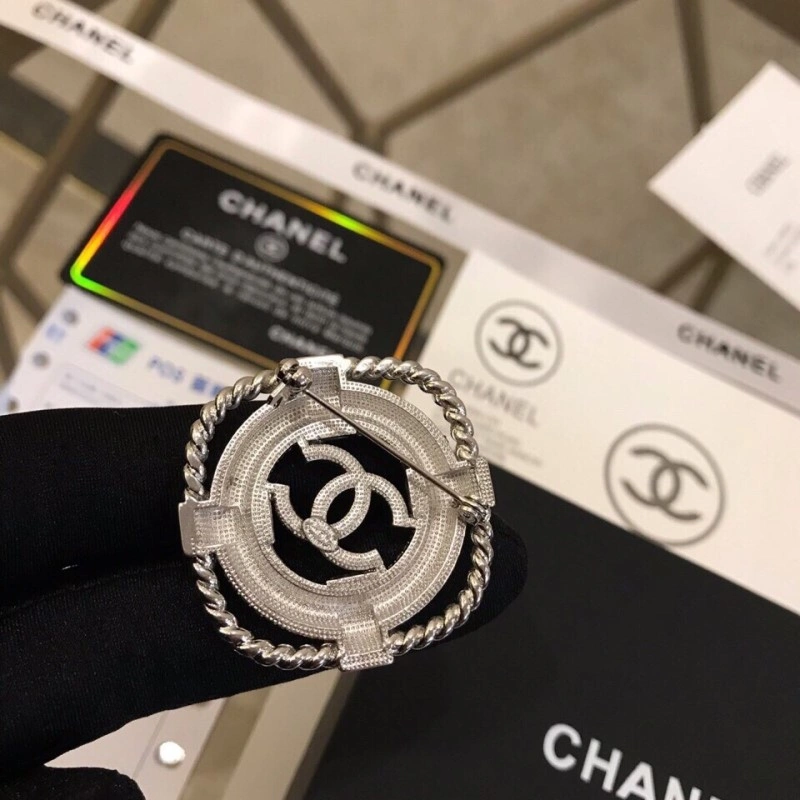 Cut-rate Chanel Brooches
