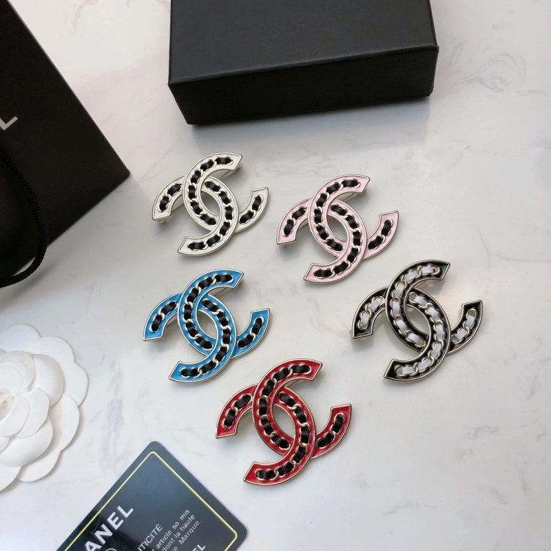 Cut-rate Chanel Brooches