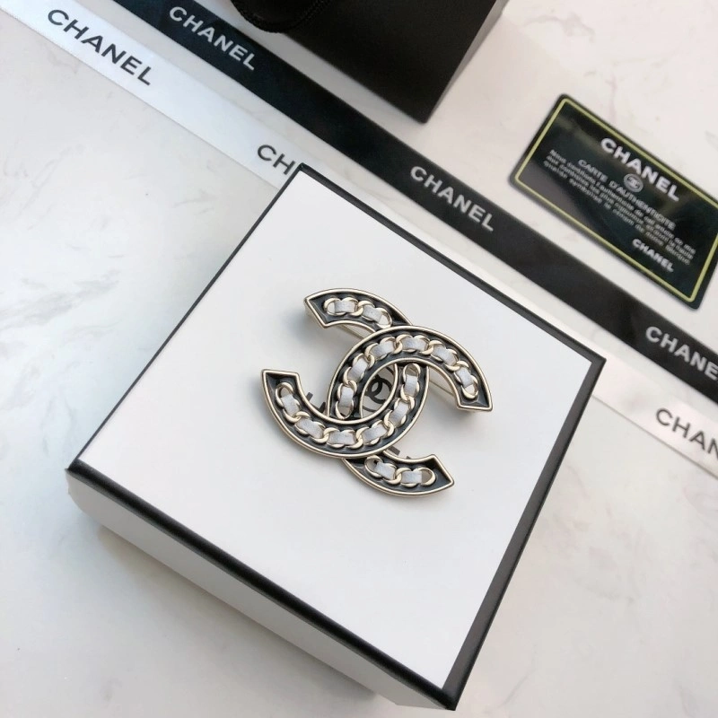 Cut-rate Chanel Brooches