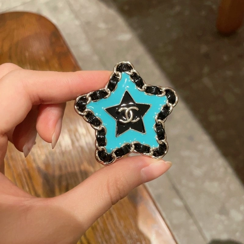 Cut-rate Chanel Brooches