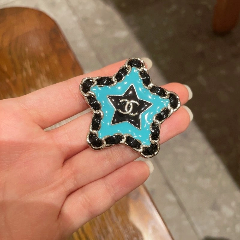 Cut-rate Chanel Brooches