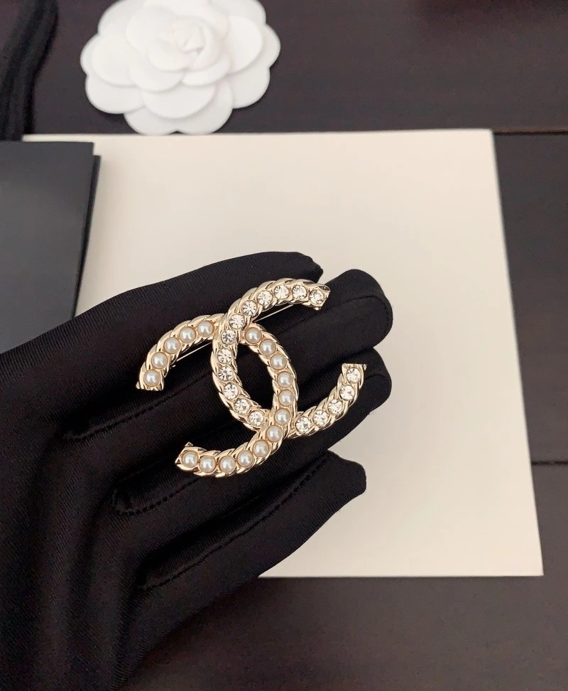 Cut-rate Chanel Brooches