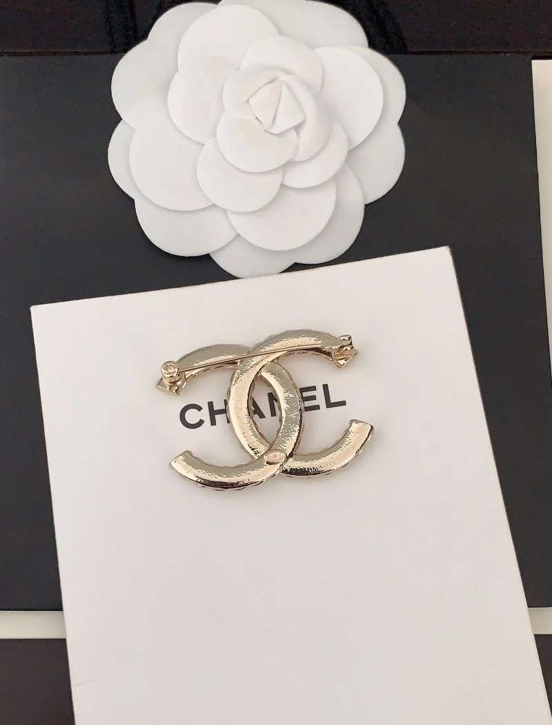 Cut-rate Chanel Brooches