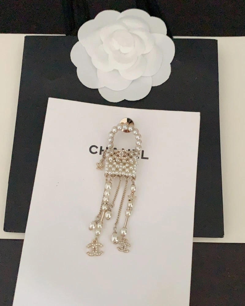 Indistinguishable Chanel Brooches