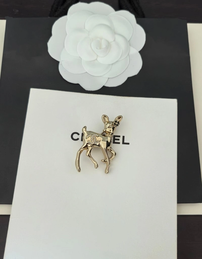 Indistinguishable Chanel Brooches