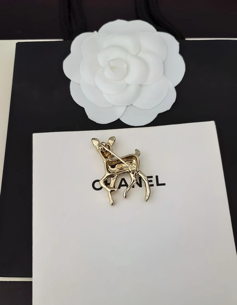 Indistinguishable Chanel Brooches