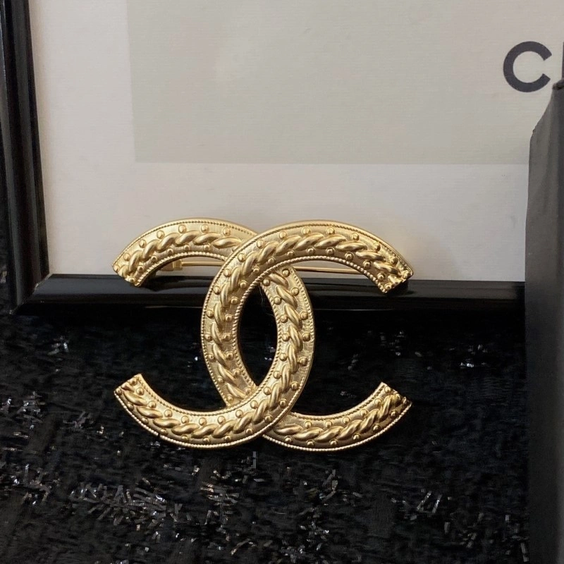 Reasonably priced Chanel Brooches