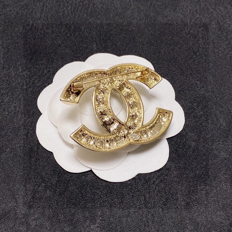 Cut-rate Chanel Brooches