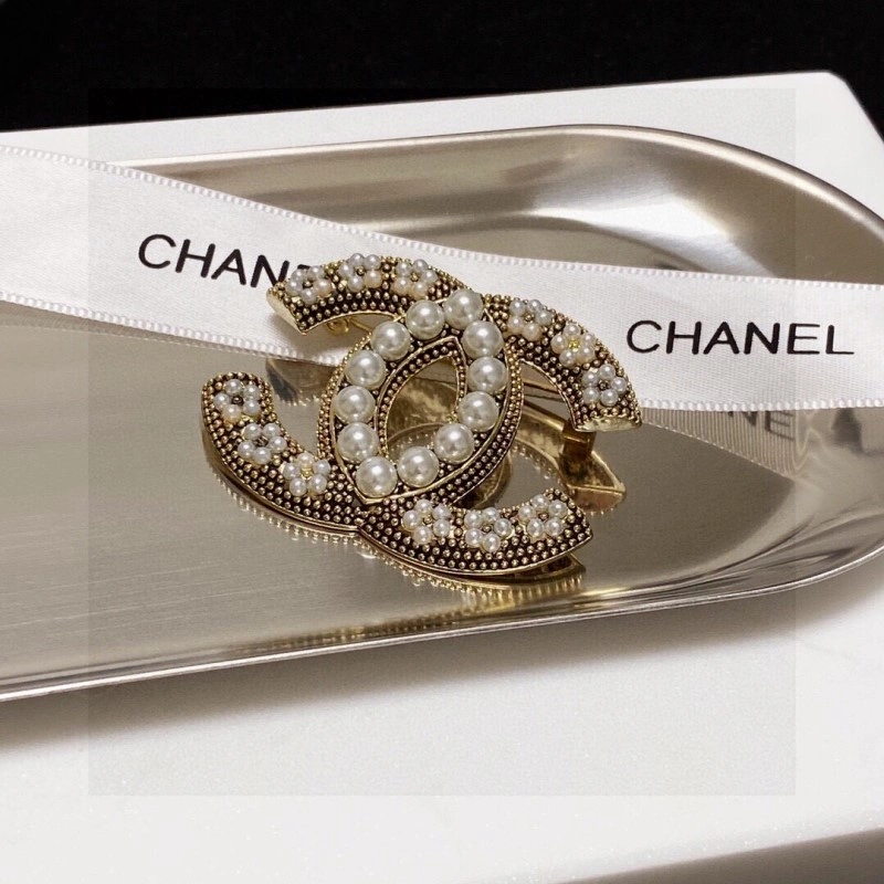 Cut-rate Chanel Brooches