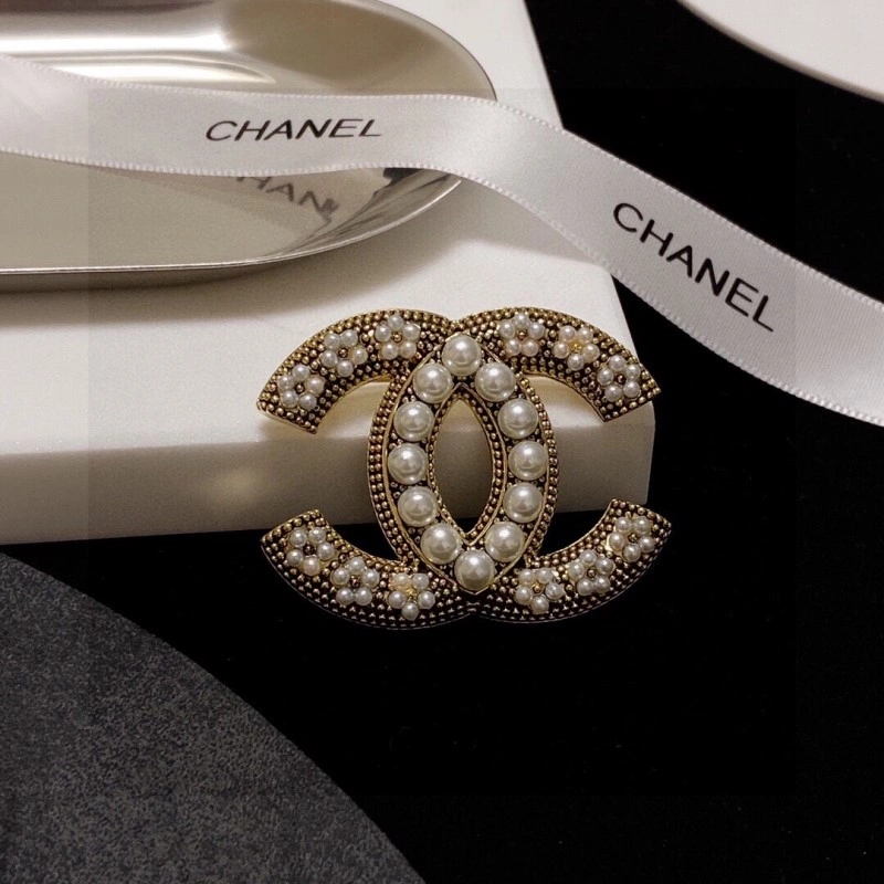 Cut-rate Chanel Brooches