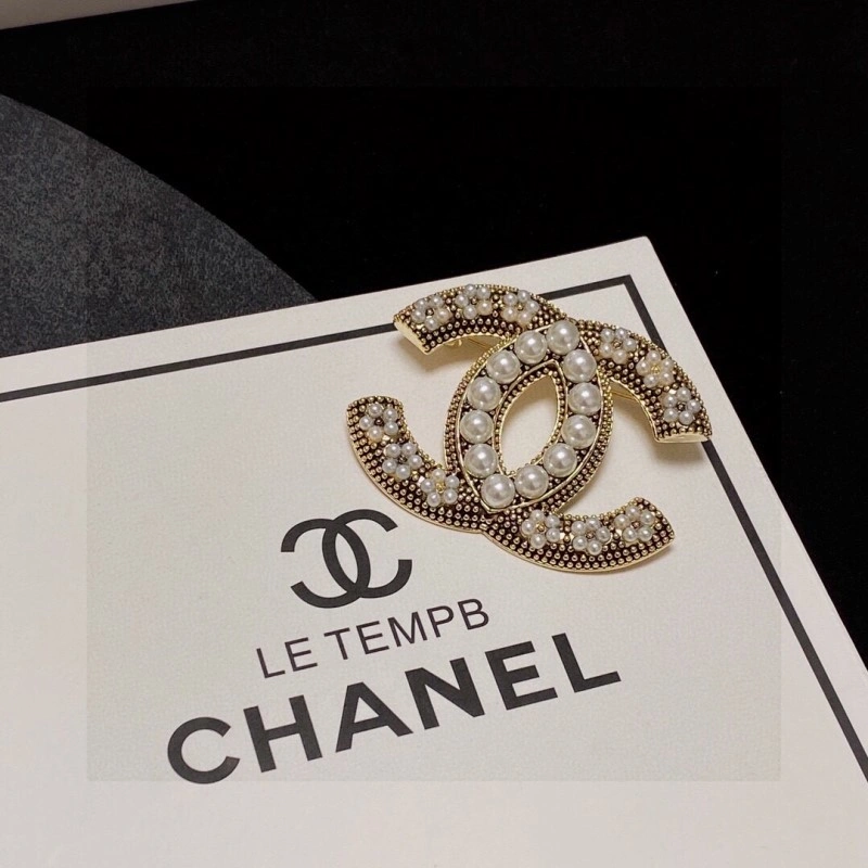 Cut-rate Chanel Brooches
