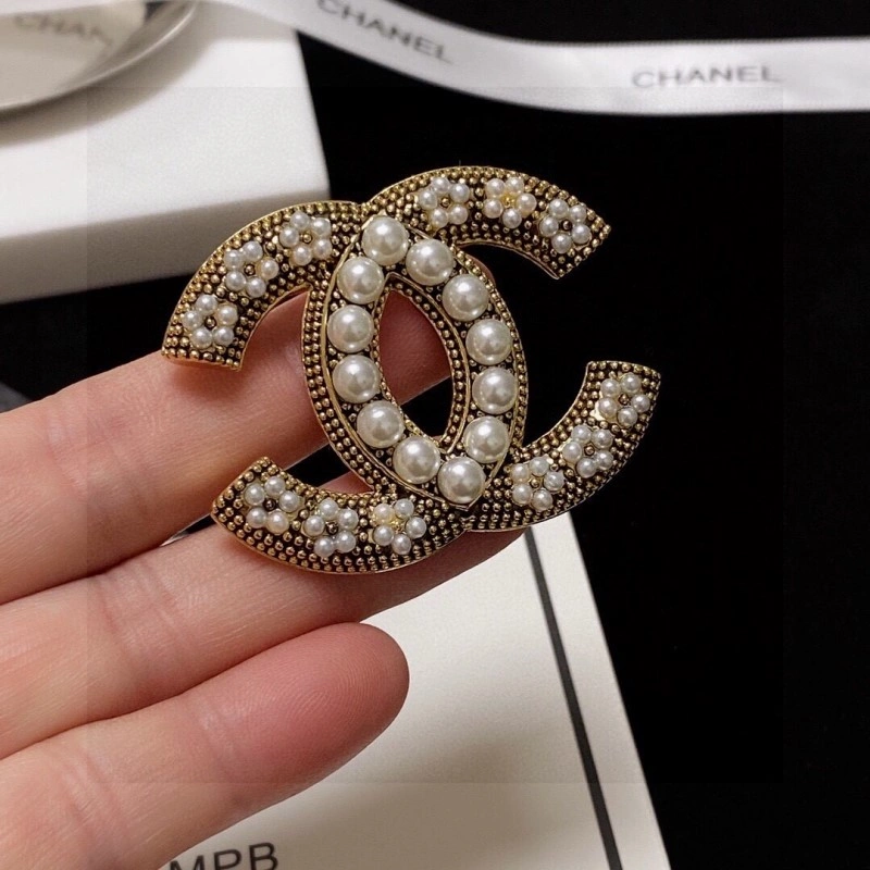 Cut-rate Chanel Brooches