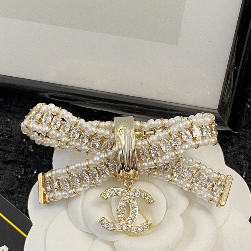 Cut-rate Chanel Brooches