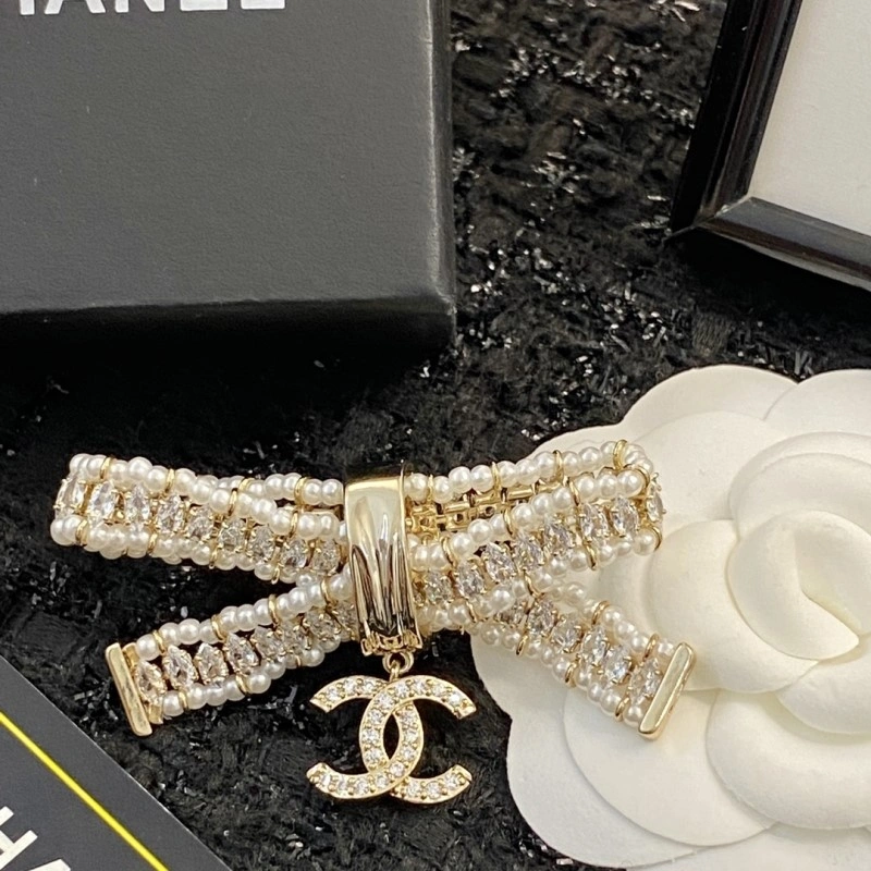 Cut-rate Chanel Brooches
