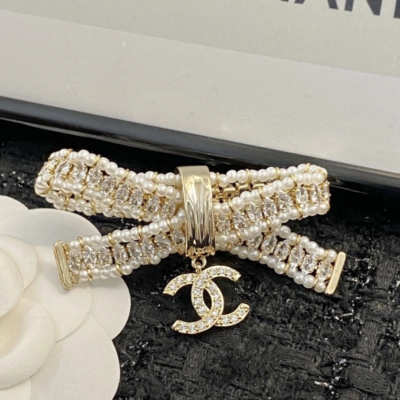 Cut-rate Chanel Brooches