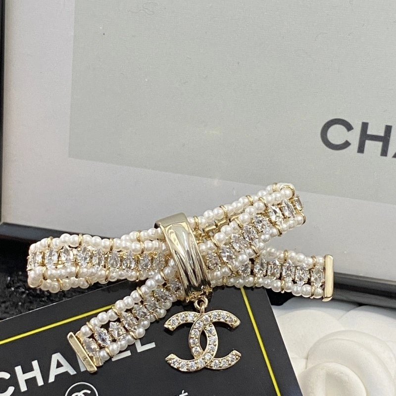 Cut-rate Chanel Brooches