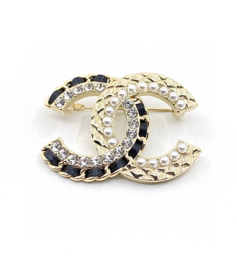 Top mirror Chanel Brooches