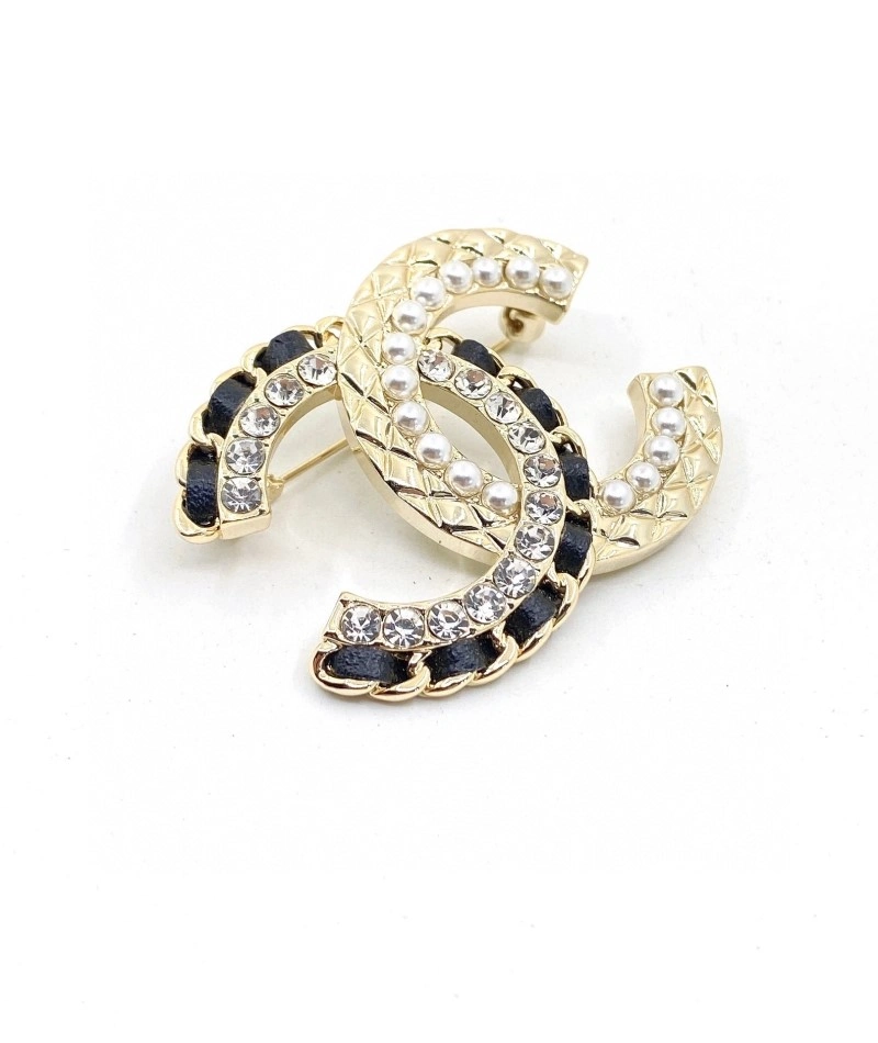 Top mirror Chanel Brooches