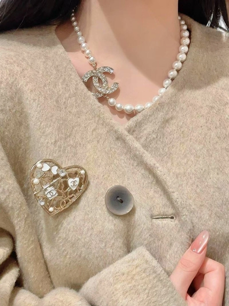 Brand-authenticated Chanel Brooches