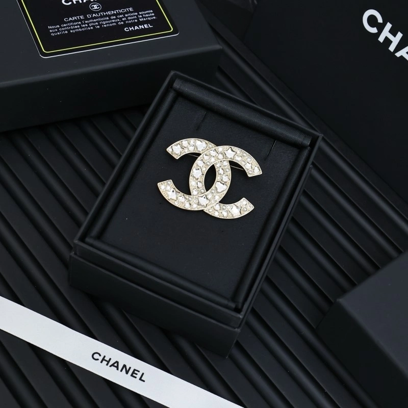 Cut-rate Chanel Brooches