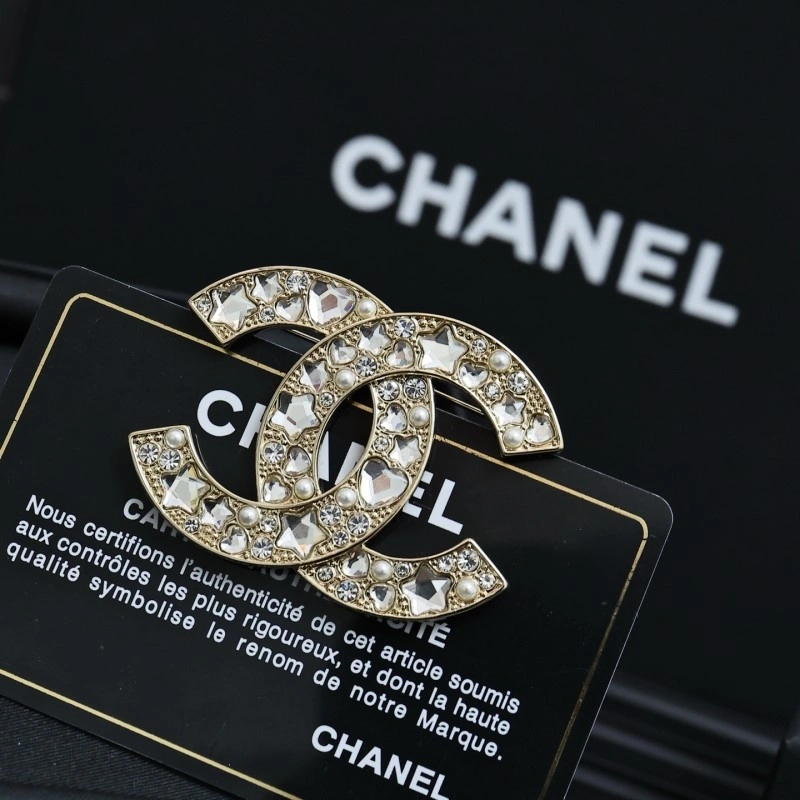 Cut-rate Chanel Brooches