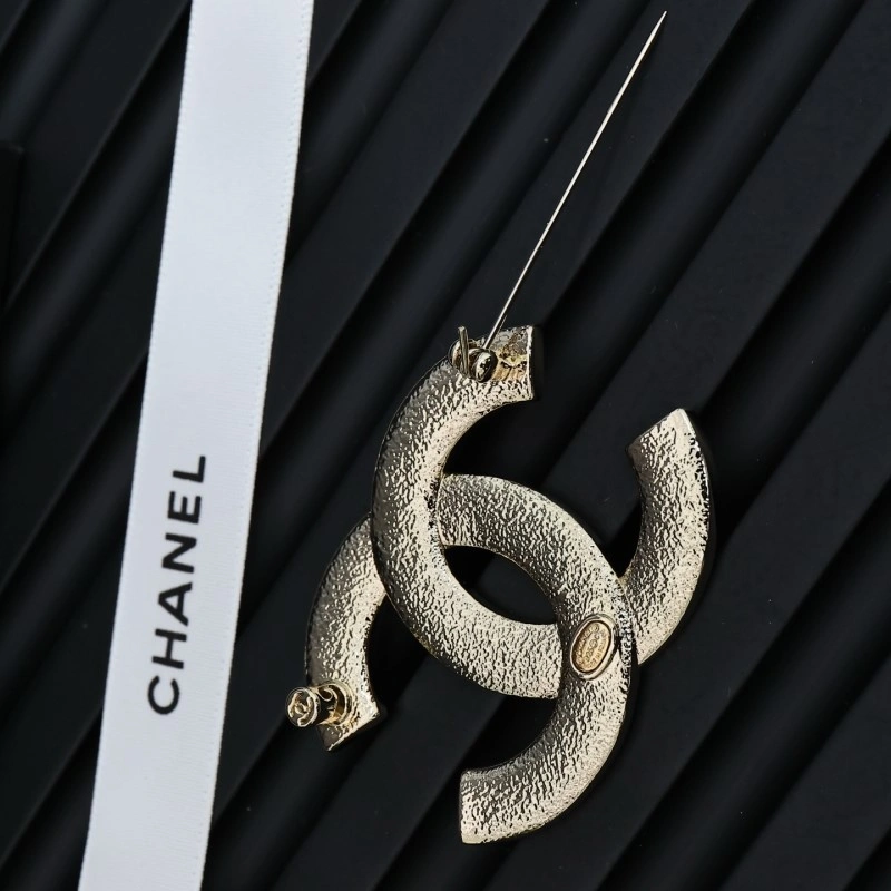 Cut-rate Chanel Brooches
