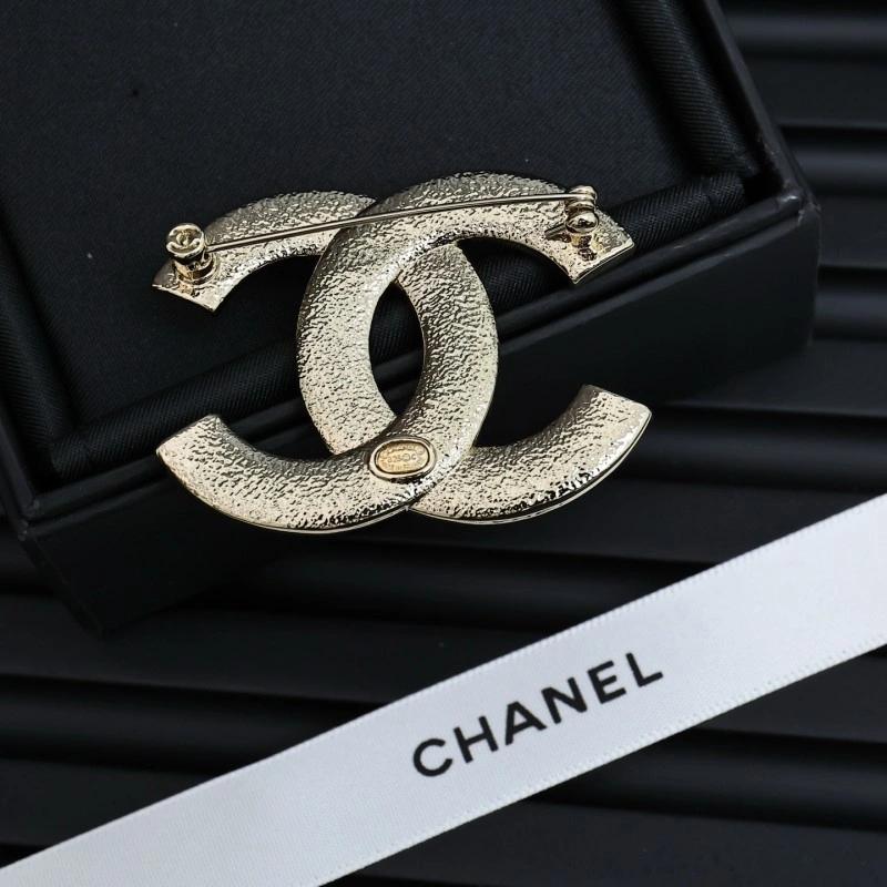 Cut-rate Chanel Brooches