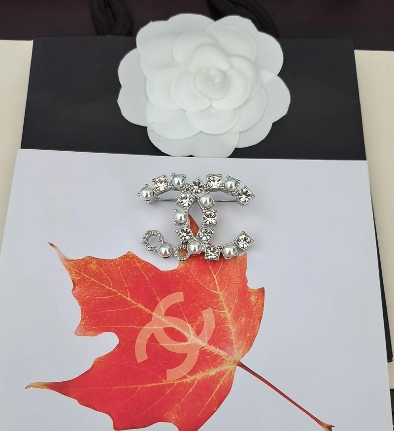 Indistinguishable Chanel Brooches