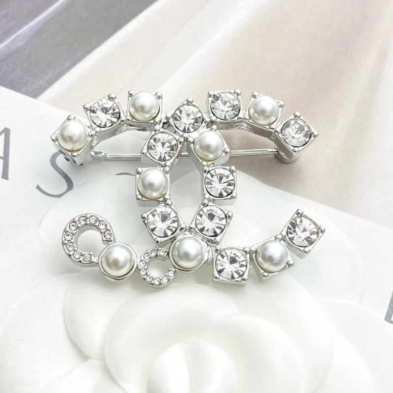 Cut-rate Chanel Brooches