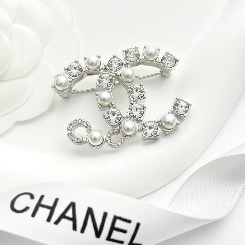 Cut-rate Chanel Brooches