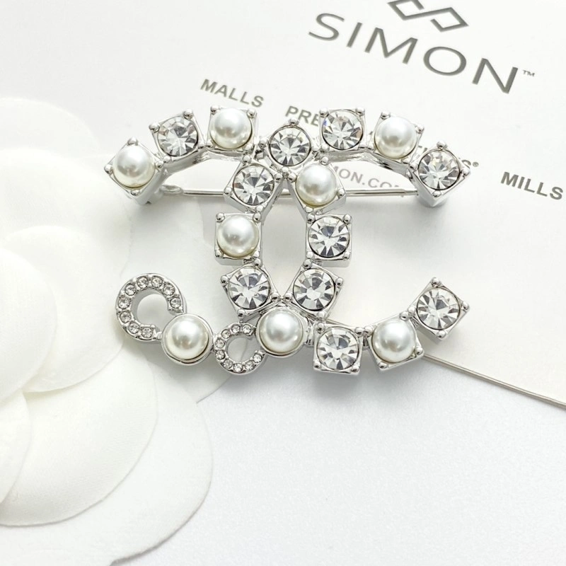 Cut-rate Chanel Brooches