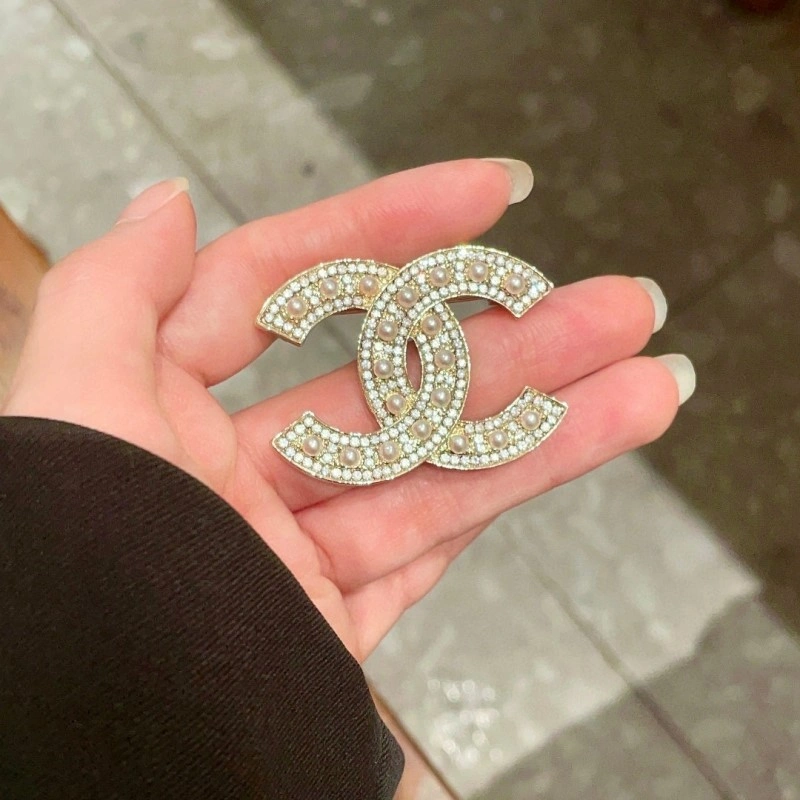 Cut-rate Chanel Brooches