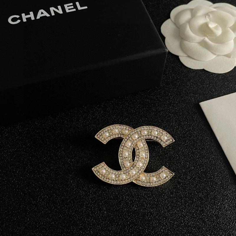 Cut-rate Chanel Brooches
