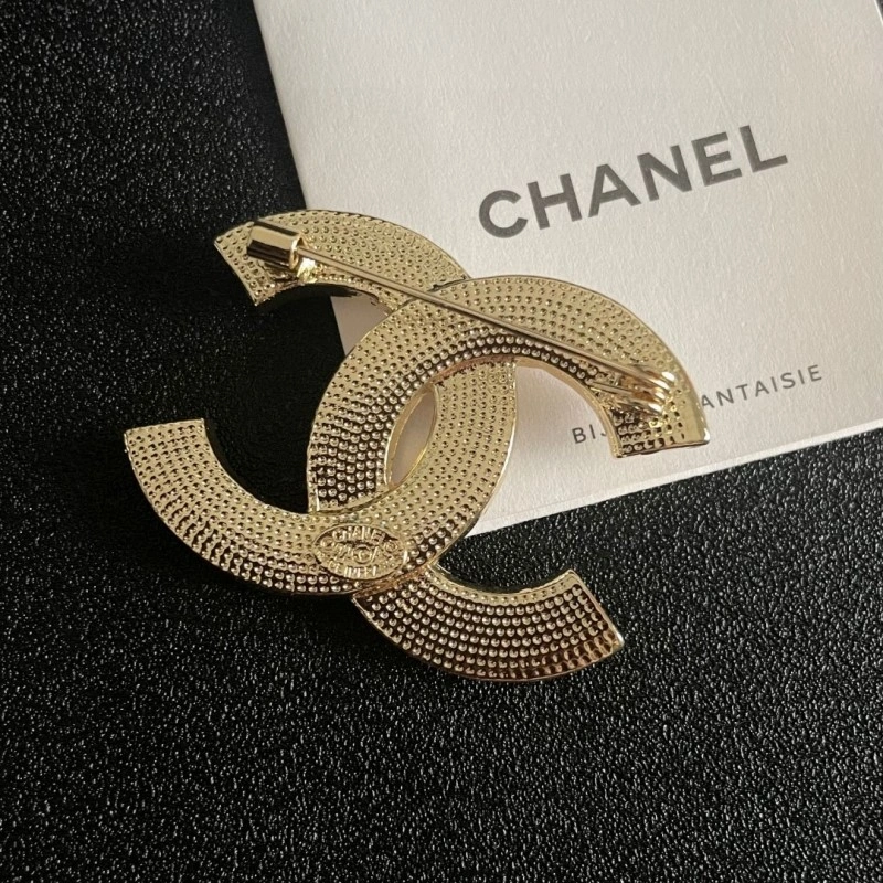 Cut-rate Chanel Brooches