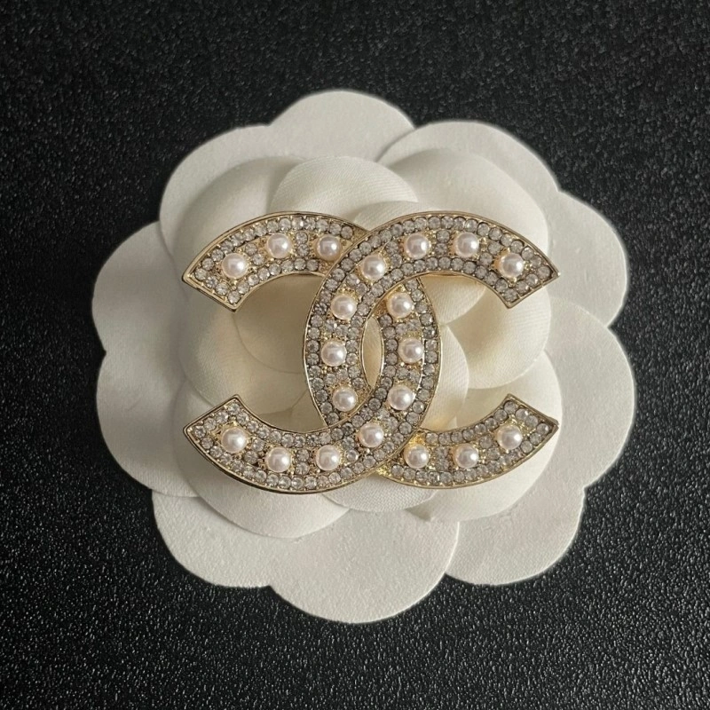 Cut-rate Chanel Brooches