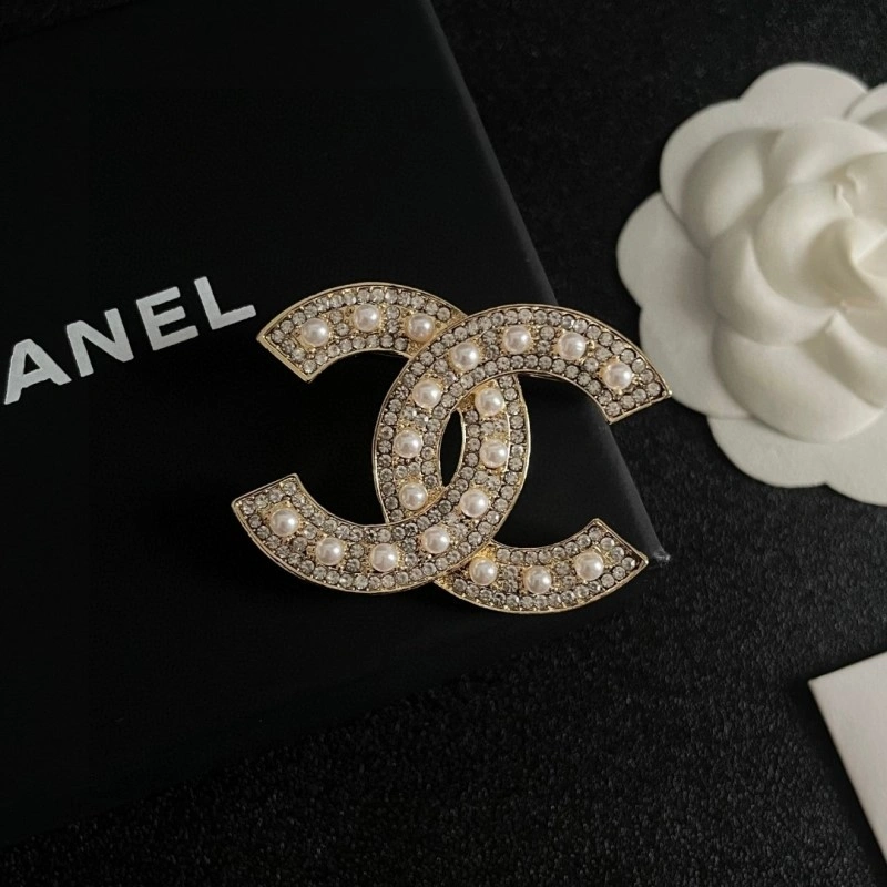 Cut-rate Chanel Brooches
