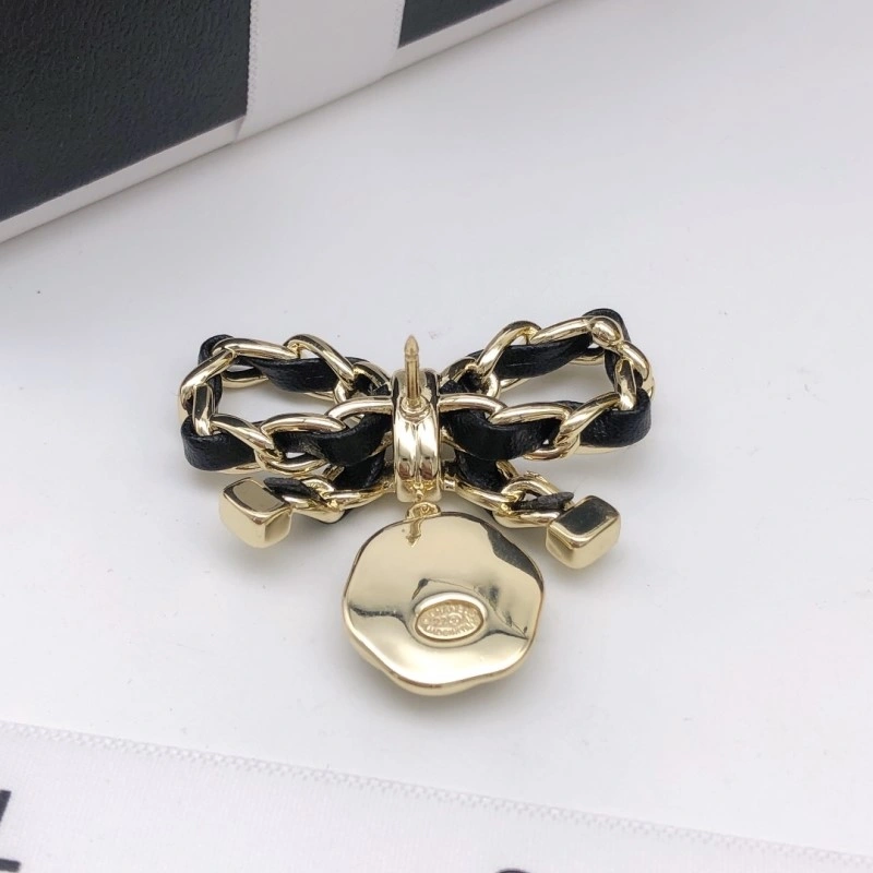 Low-cost Chanel Brooches